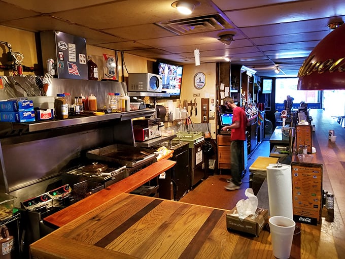 The kitchen pass – where burger dreams come true. That well-seasoned flat-top has more flavor memory than most culinary school graduates.