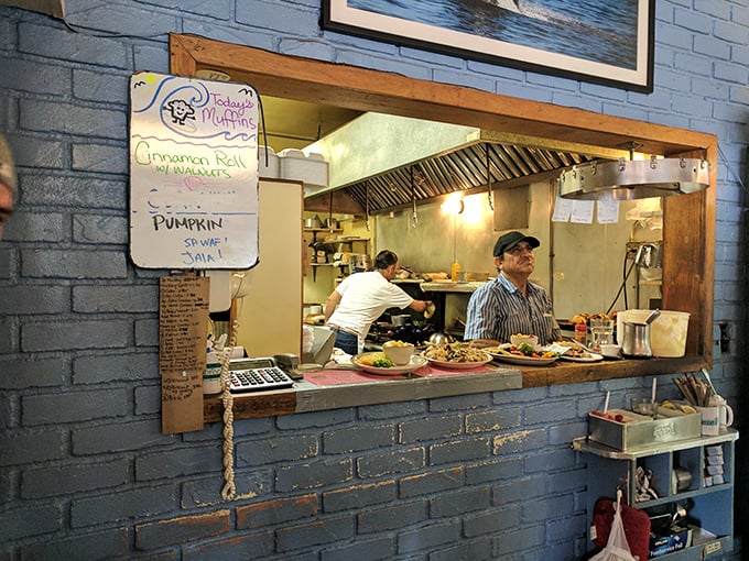 The kitchen pass—that magical portal where ordinary ingredients transform into the plates that keep locals coming back for decades.