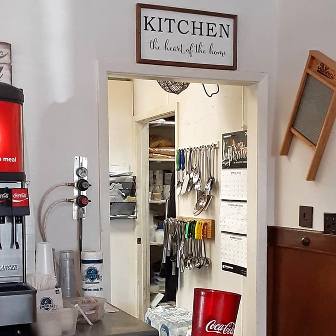 A sign proclaiming "Kitchen: the heart of the home" hangs above the doorway—a perfect summary of Belle's philosophy that good food creates family.