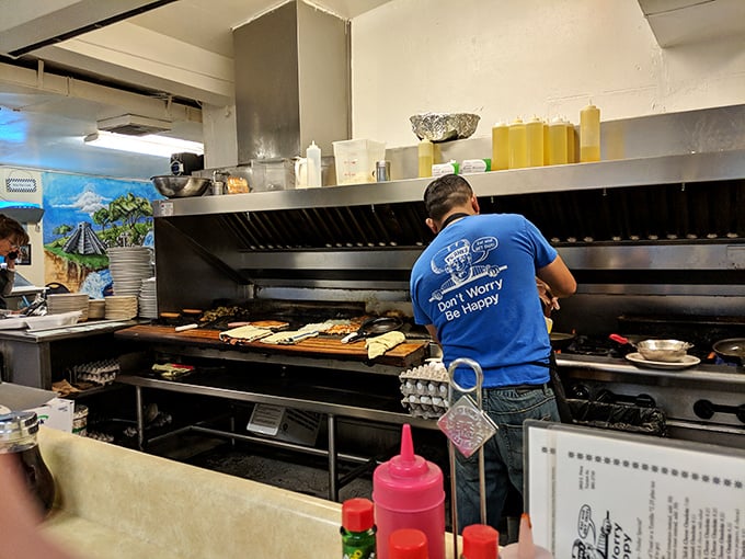 Behind every great diner is a kitchen maestro orchestrating breakfast symphonies. That "Don't Worry, Be Happy" shirt isn't just clothing—it's a philosophy.