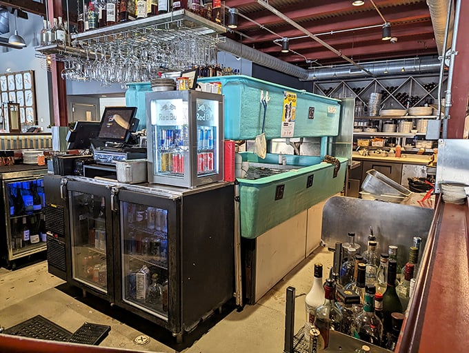 Behind every great seafood feast is a kitchen with character—this turquoise prep station adds a splash of coastal color to industrial efficiency.