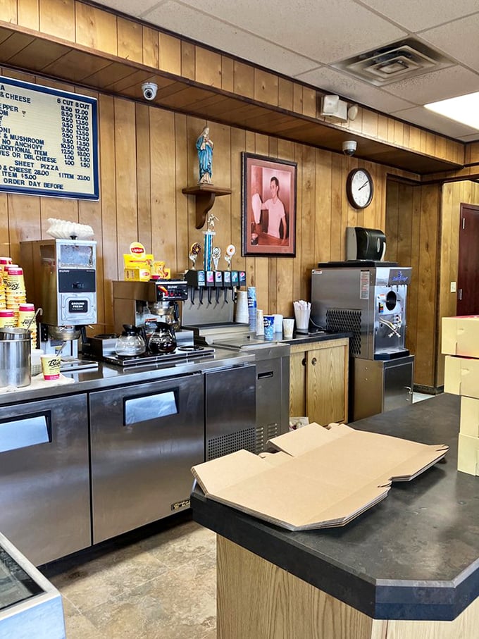 The working heart of Biagio's—where soda machines meet pizza boxes in a symphony of no-frills functionality. This is where the magic happens.