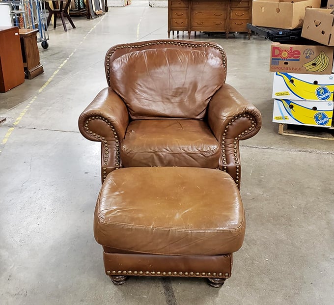 This leather chair isn't just comfortable—it's already broken in by someone who probably had excellent taste in scotch.