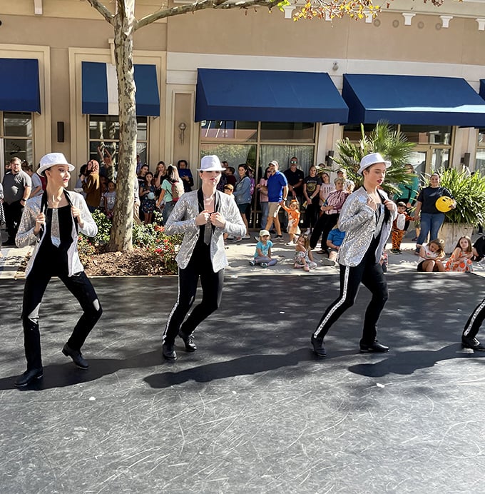 Performers bring unexpected entertainment to shoppers—proving The Market Common understands retail therapy should include actual therapy.