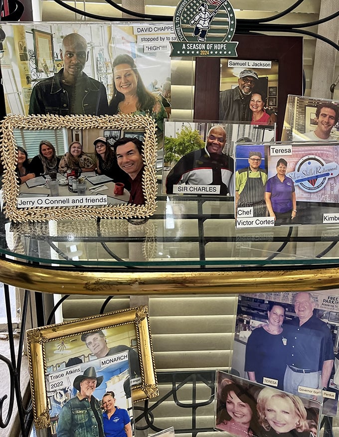 The wall of fame showcases visitors who came for breakfast and left as converts. Southern hospitality's hall of records.