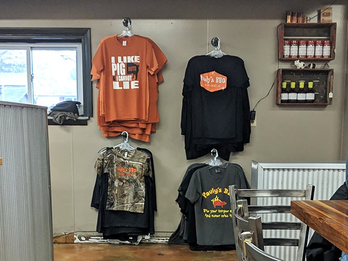 Pauly's merch wall – because sometimes wearing your BBQ loyalty on your sleeve (or chest) just makes sense.