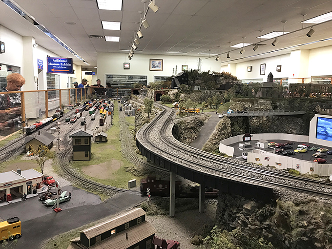 This model train display proves that some folks take their hobbies seriously enough to recreate entire mountain landscapes indoors.