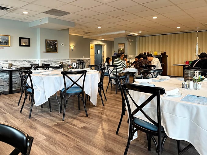 White tablecloths and comfortable seating create an inviting atmosphere for lingering meals. Where memories are made between bites of legendary seafood.