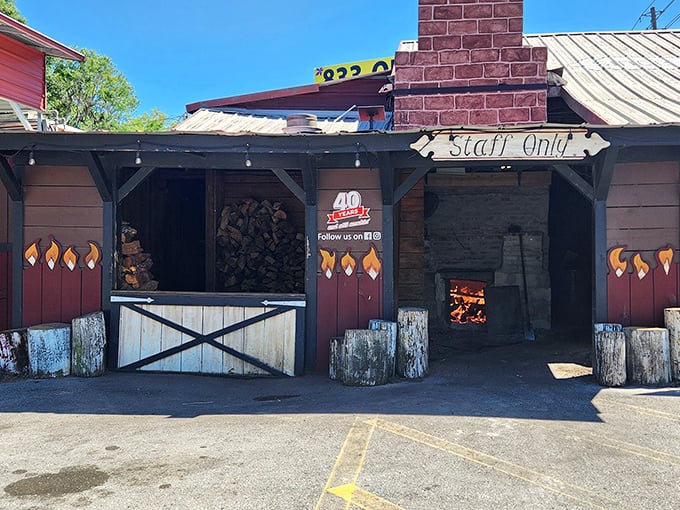 The smoke source—where patience and expertise transform raw ingredients into edible art. That fire has more followers than most Instagram influencers.