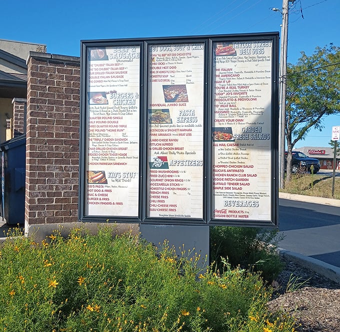 The outdoor menu board stands like a roadside prophet, proclaiming the gospel of good eating to all who pass by.