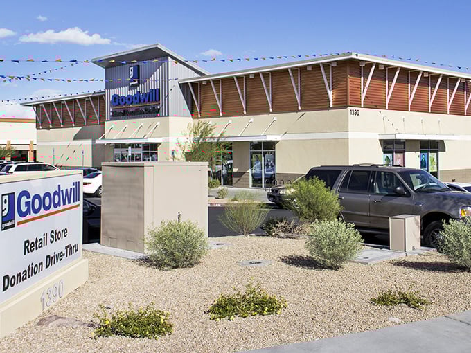 The exterior architecture blends modern design with practical desert landscaping, making thrifting look surprisingly upscale and intentional for Henderson.