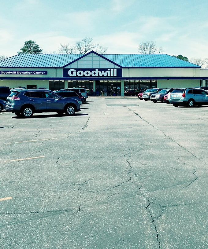 The parking lot: first stop on your journey to secondhand nirvana. Cars gather like bargain-hunters at a estate sale.