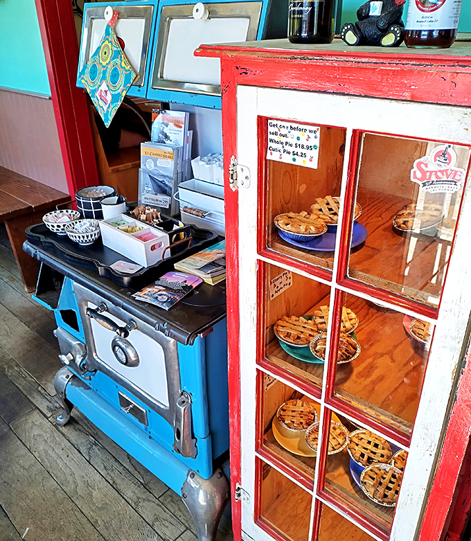 The pie case—where willpower goes to die and vacation calories don't count. These lattice-topped beauties have launched a thousand "just one more bite" negotiations.