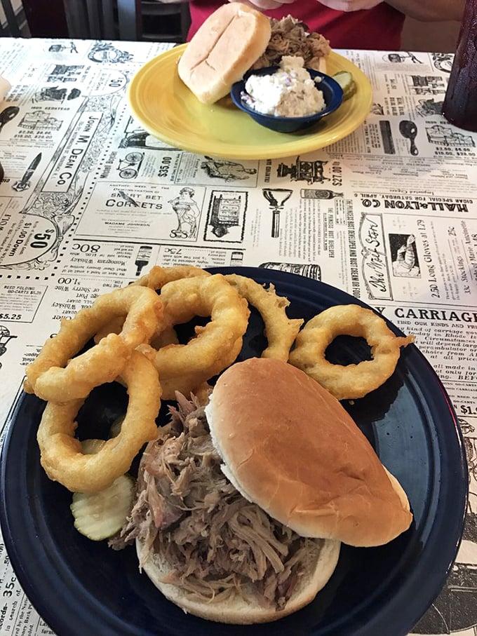 A pulled pork sandwich that doesn't need fancy tricks—just honest smoke, tender meat, and a bun that knows its supporting role.