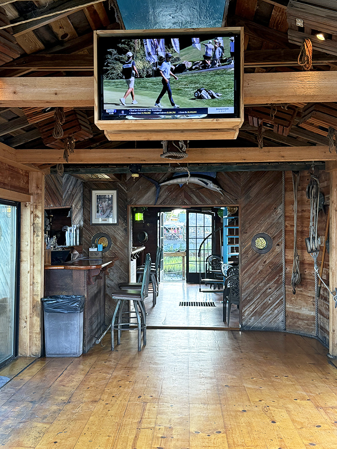 Weathered wood, nautical touches, and a TV for catching the game—this is Florida's version of the perfect man cave.