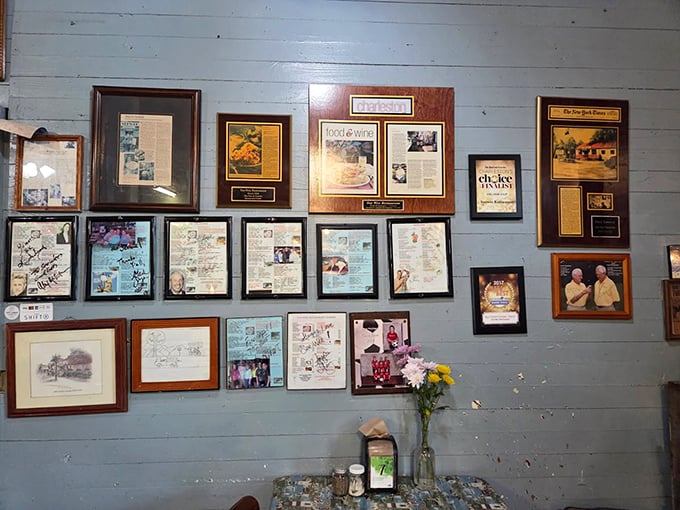 The wall of fame tells stories of satisfied customers and media recognition—a scrapbook of deliciousness through the decades.
