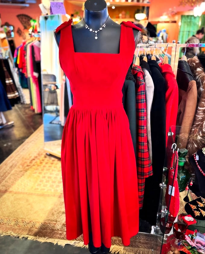 That red dress isn't just hanging there—it's practically narrating all the adventures it plans to have with whoever takes it home.