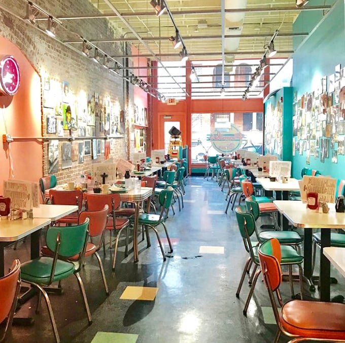 The retro dining room hums with conversation and contentment, where vinyl seats witness daily breakfast miracles.