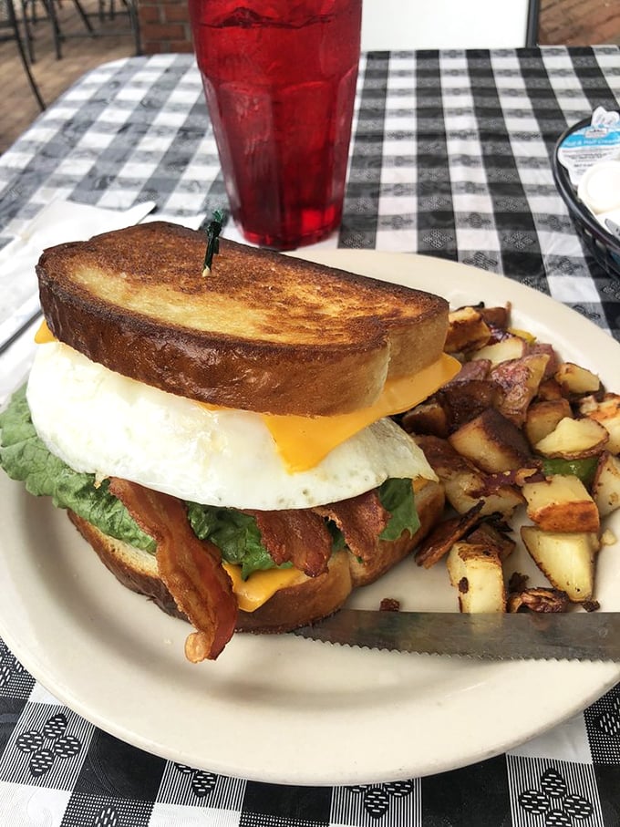 The breakfast sandwich that makes Monday mornings bearable. Melty cheese, crisp bacon, and a perfectly fried egg—the holy trinity of morning salvation.