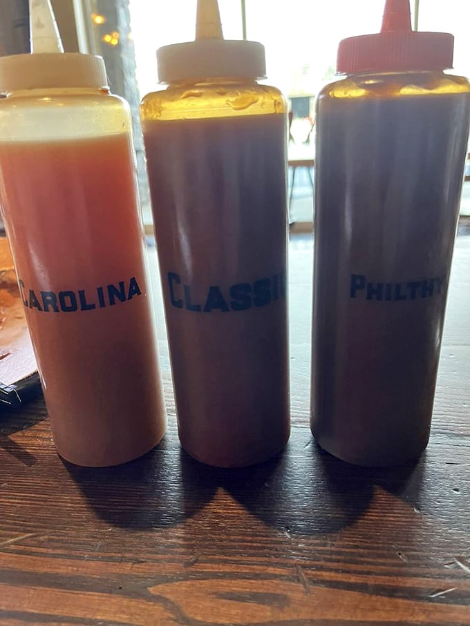 These sauce bottles aren't just condiments—they're personality tests in liquid form, from Carolina tang to Philthy richness, revealing your BBQ soul.