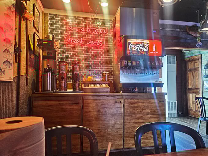 Fresh from the Great Lakes glows in neon, a promise kept with every order that passes through the kitchen window to eager hands.