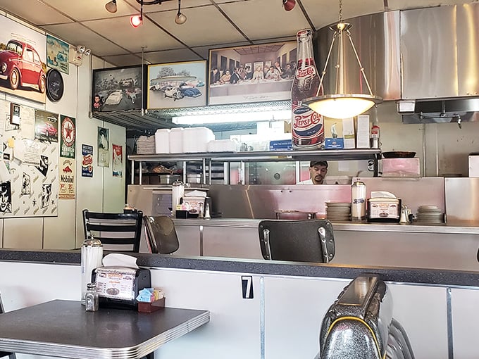 Classic Americana on display—where vintage car photos watch over diners and the grill has probably heard every story Fresno has to offer.