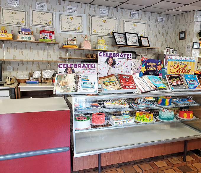 The celebration station – where cake catalogs and sample displays turn ordinary Tuesdays into potential parties.