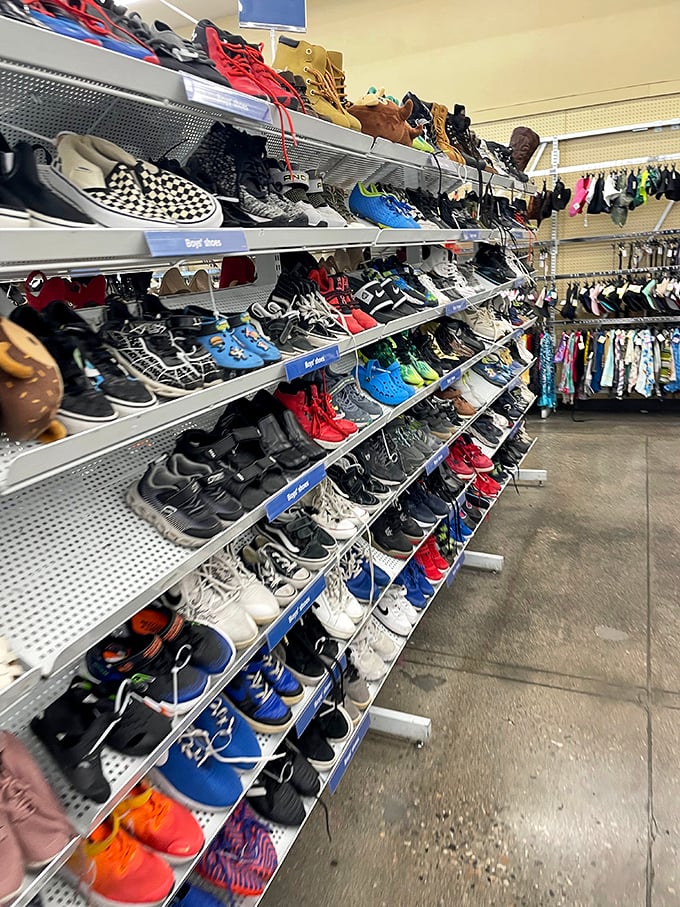 The shoe section—a footwear library where gently-used Nikes neighbor vintage boots, all priced less than a fancy Las Vegas cocktail.