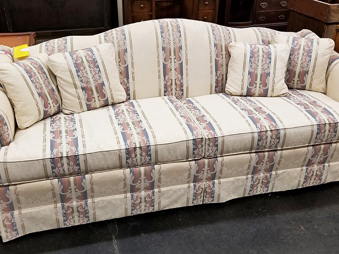 A sofa that's seen better days but still has stories to tell—like that one uncle who dominates Thanksgiving with tales from "back when."