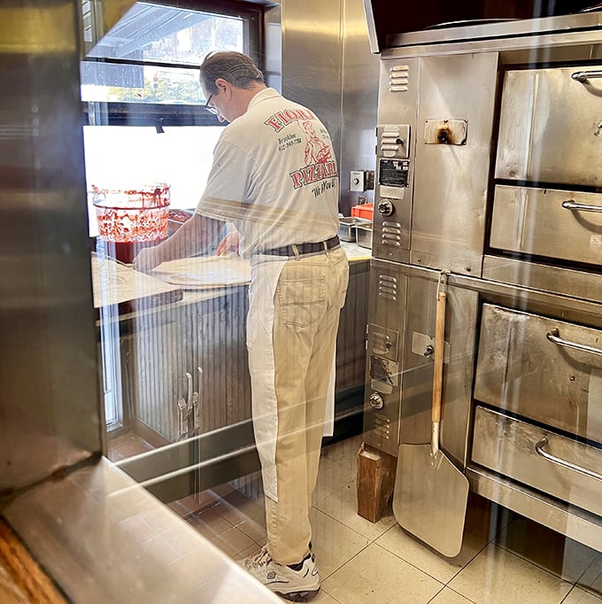 Behind every great pizza is someone who knows exactly how long "just another minute" really means. Watching dough become art is its own kind of entertainment. 