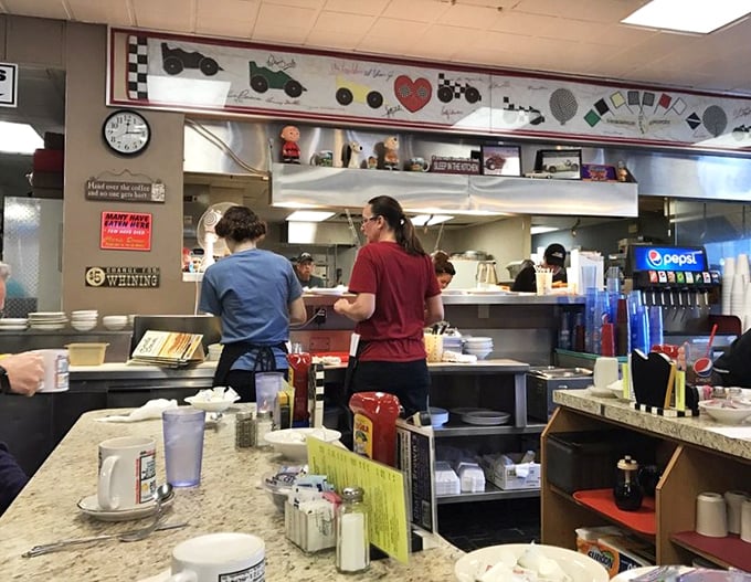 The kitchen ballet – where orders become meals through practiced movements and timing perfected over thousands of mornings serving hungry Hoosiers.