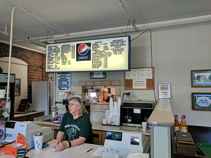 The folks behind the counter aren't "team members" or "associates" – they're the keepers of the chicken kingdom, masters of their craft.