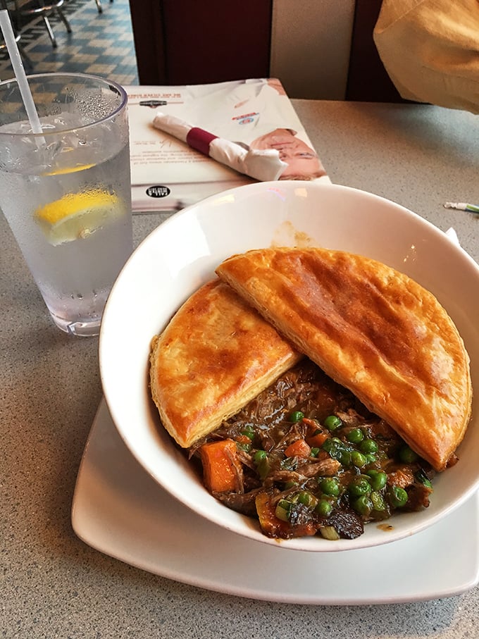 Not just a pot pie—it's a steaming fortress of pastry protecting a treasure of savory stew within.