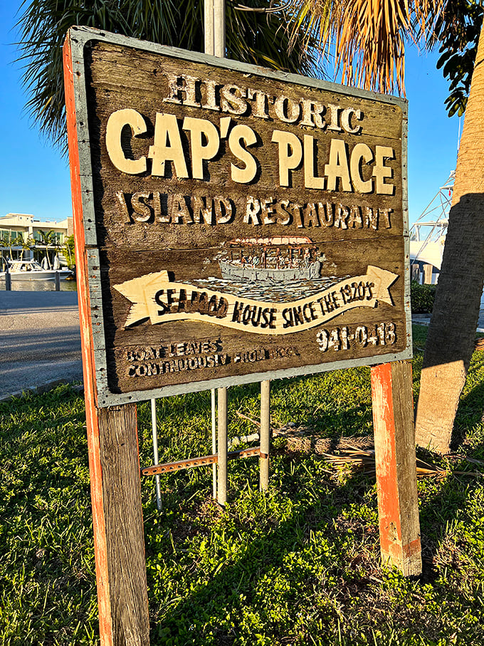 A sign that promises exactly what it delivers: historic dining with a side of maritime charm. No false advertising here.
