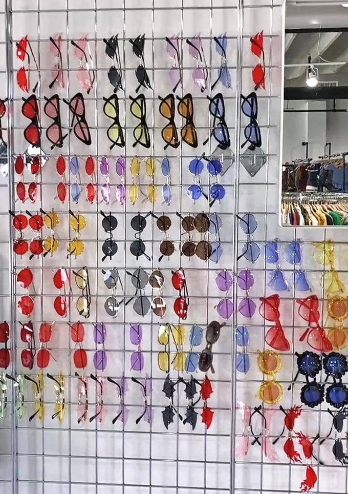 Sunglasses in every hue transform this display into a kaleidoscope of possibilities – each pair offering a different lens on your fashion future.