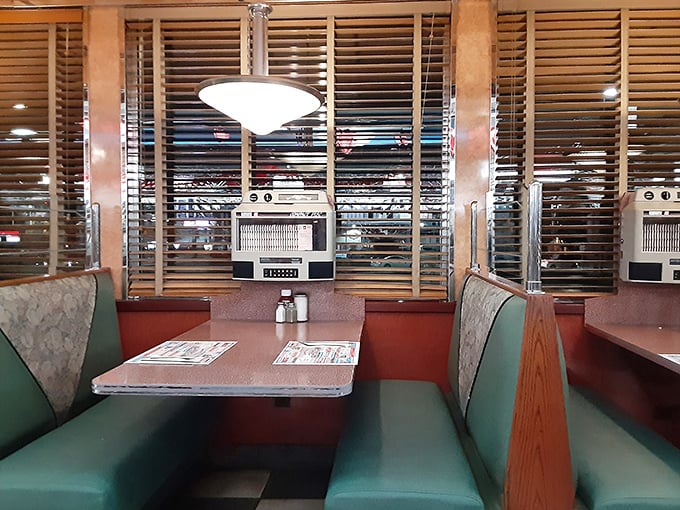 These booths have witnessed first dates, business deals, and family Sunday breakfasts—each table a stage for life's everyday dramas and celebrations.