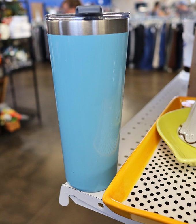That perfect shade of blue that matches nothing and everything simultaneously—thrift store tumblers are the unsung heroes of hydration on a budget.