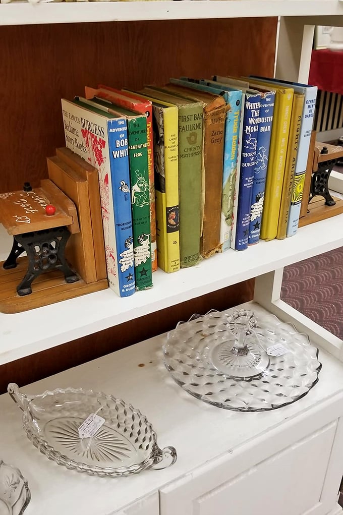 First editions and vintage glass serving pieces—because both books and dinner parties deserve proper presentation.