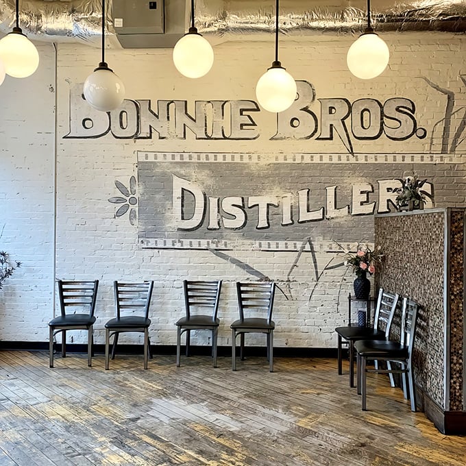 History whispers from these white brick walls. The distillery signage reminds you that in Kentucky, bourbon isn't just a drink—it's heritage.