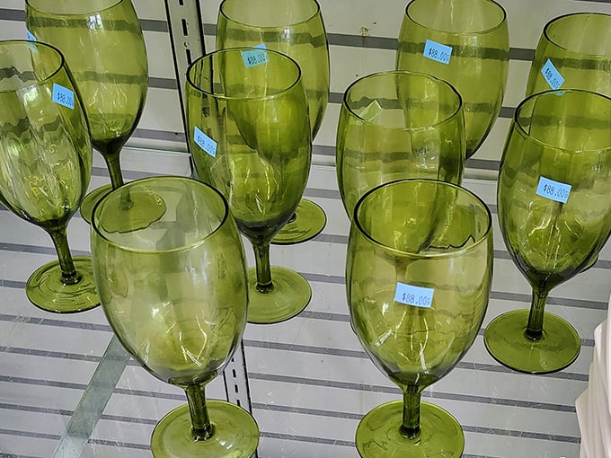 Emerald green goblets catching light like jewels on a shelf. Perfect for serving everything from bargain wine to fancy water with an air of vintage elegance.