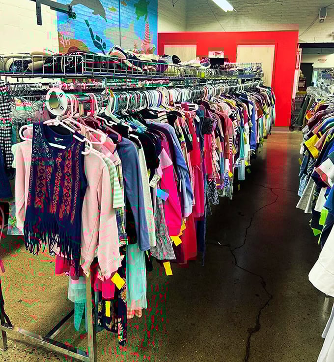 Children's clothing displayed with playful precision—tiny fashionistas and their budget-conscious parents find common ground in these colorful racks.