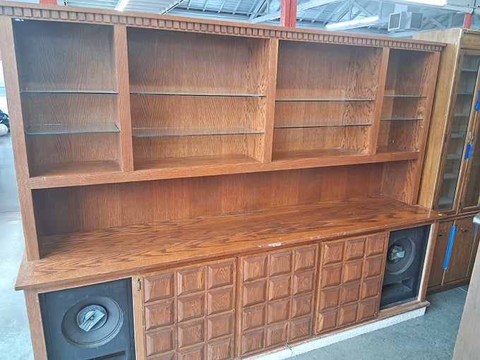This vintage entertainment center isn't just furniture – it's a time capsule from when "surround sound" meant speakers built into your cabinetry.