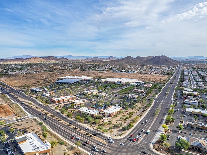 From above, Peoria unfolds in neat grids framed by desert mountains—a balance of city life and open space.