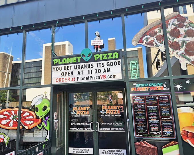 Planet Pizza's alien-themed storefront proves that great pizza is universal – even extraterrestrials would line up for a slice!