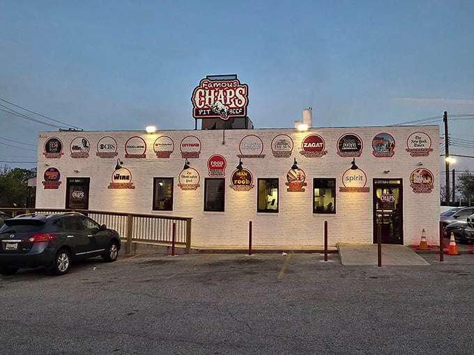 The wall of accolades at Chaps Pit Beef isn't just decoration - it's a testament to decades of barbecue perfection.