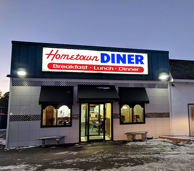 When the neon glows at twilight, comfort food seekers know exactly where to gather.