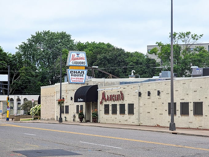 That classic white brick exterior houses a St. Paul institution where your parents probably celebrated something special – with excellent steaks, of course.