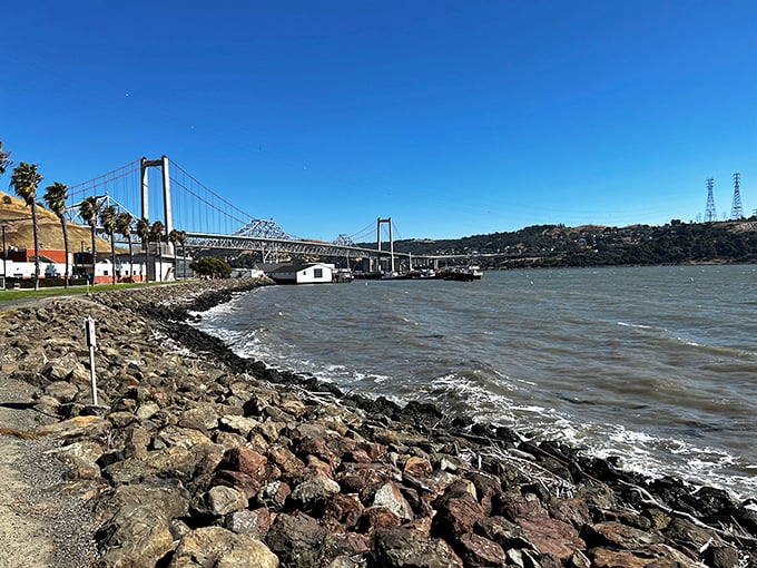 Waterfront living becomes reality when you discover this hidden gem tucked between expensive neighbors.