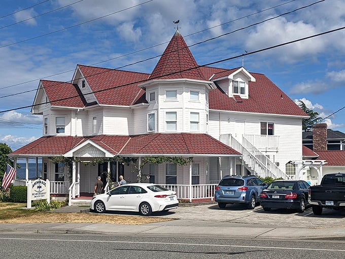 The Anchorage Inn stands like a Victorian grande dame overlooking the water, her red roof a landmark for sailors and lost tourists alike.