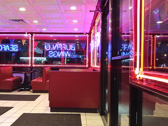 The evening glow transforms this corner spot into something from a neon-noir film—if that film was about really good chicken.